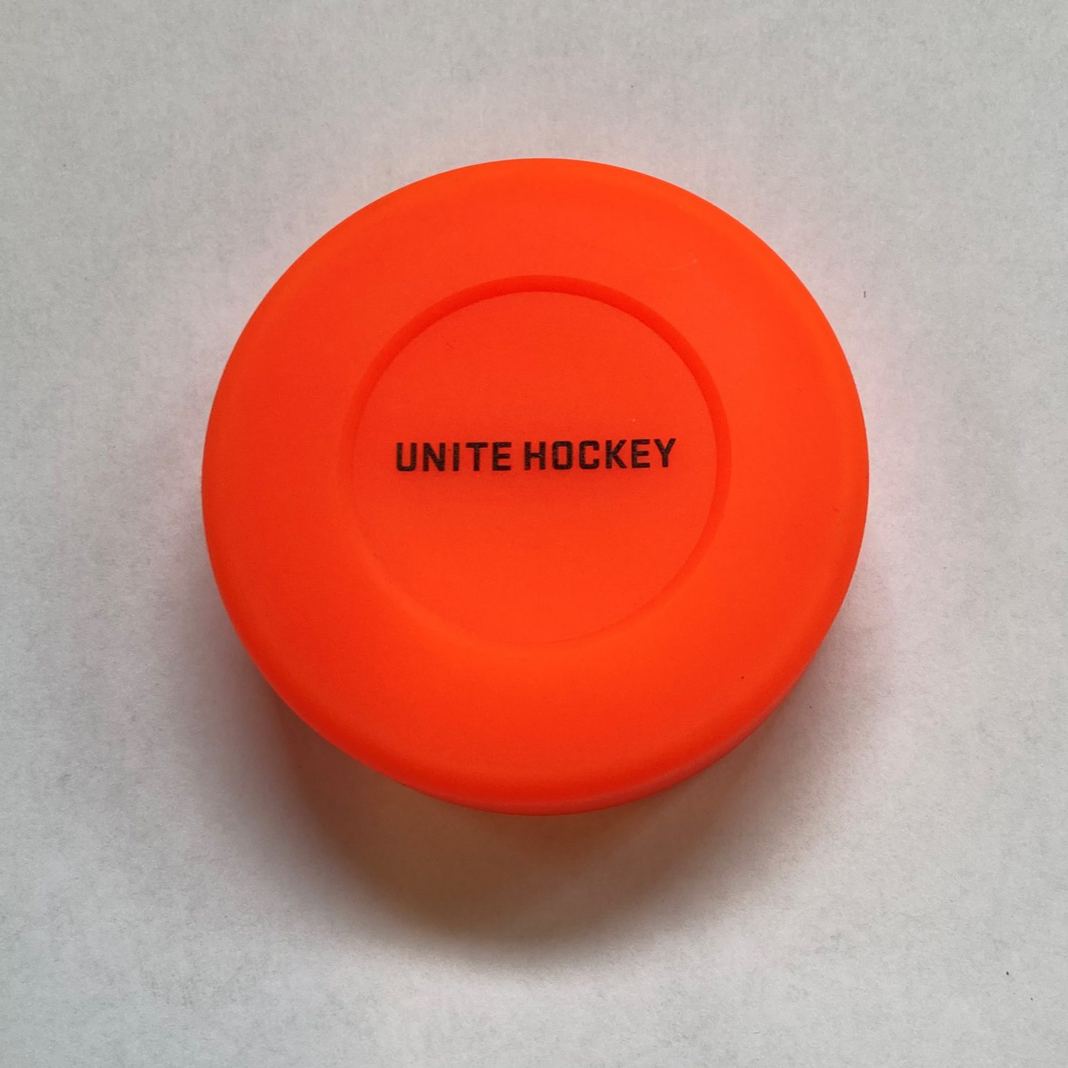 puck orange - Unite Hockey